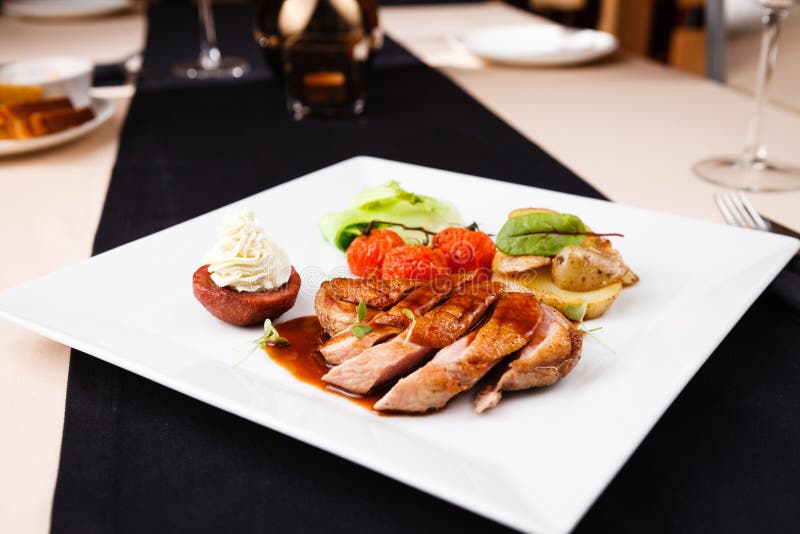 Roasted duck with pear stock photo. Image of poultry - 99571578