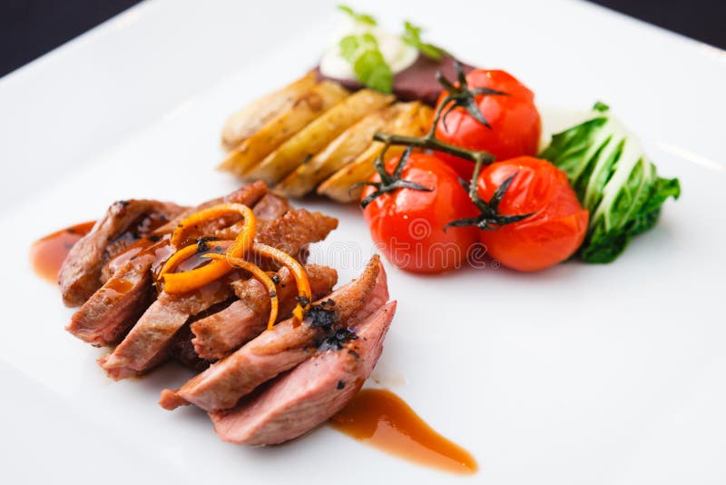 Roasted duck with pear stock image. Image of dish, dinner - 100186709