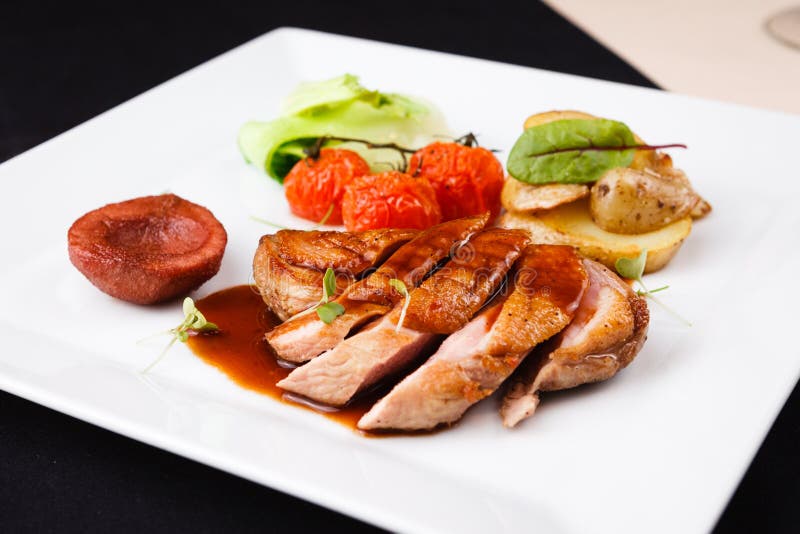 Roasted duck with pear stock photo. Image of gourmet - 100189366