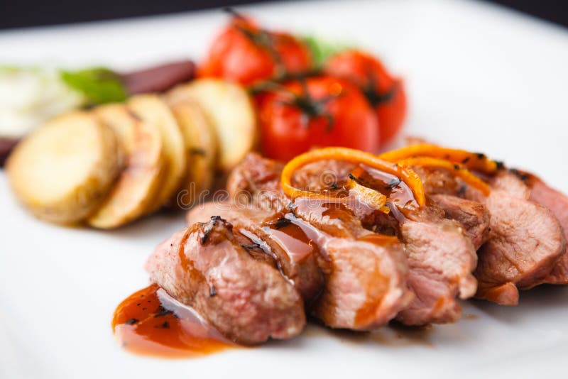 Roasted duck with pear stock photo. Image of plate, green - 101163416