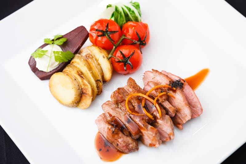 Roasted duck with pear stock photo. Image of meal, closeup - 101642484