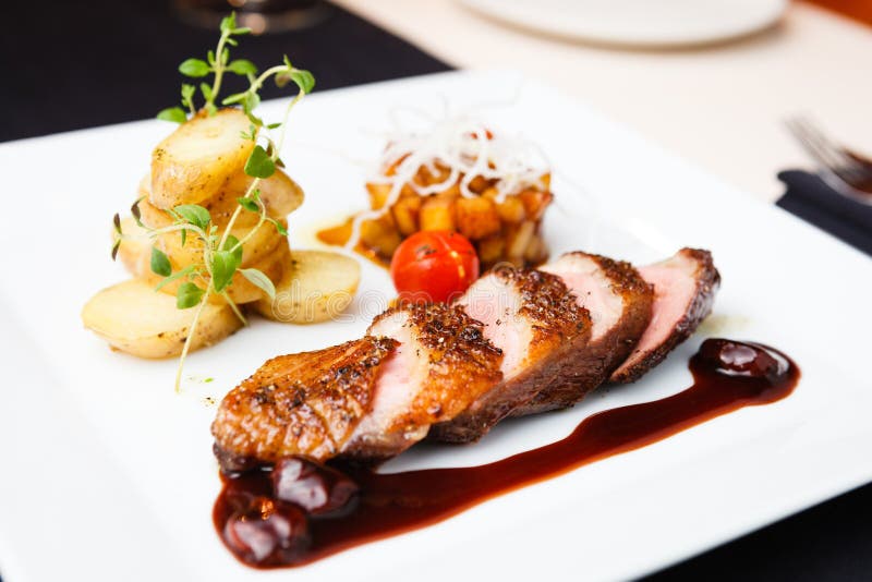 Roasted duck with pear stock photo. Image of plate, cuisine - 107901988