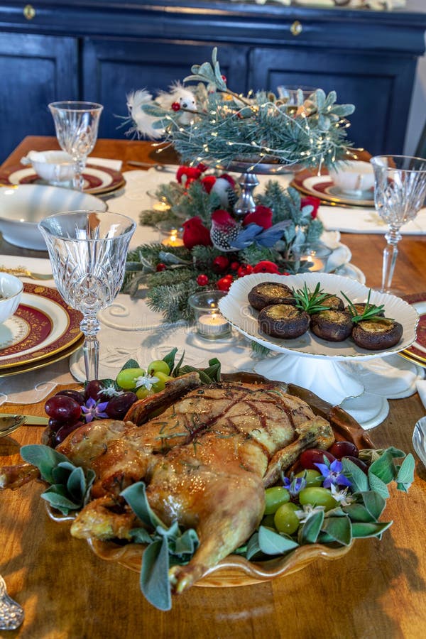 Roasted Duck on a Platter with Sage Leaves and Grapes Stock Photo ...