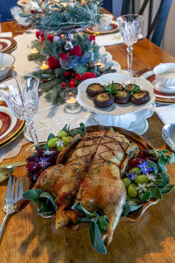 Roasted Duck on a Platter with Sage Leaves and Grapes Stock Image ...
