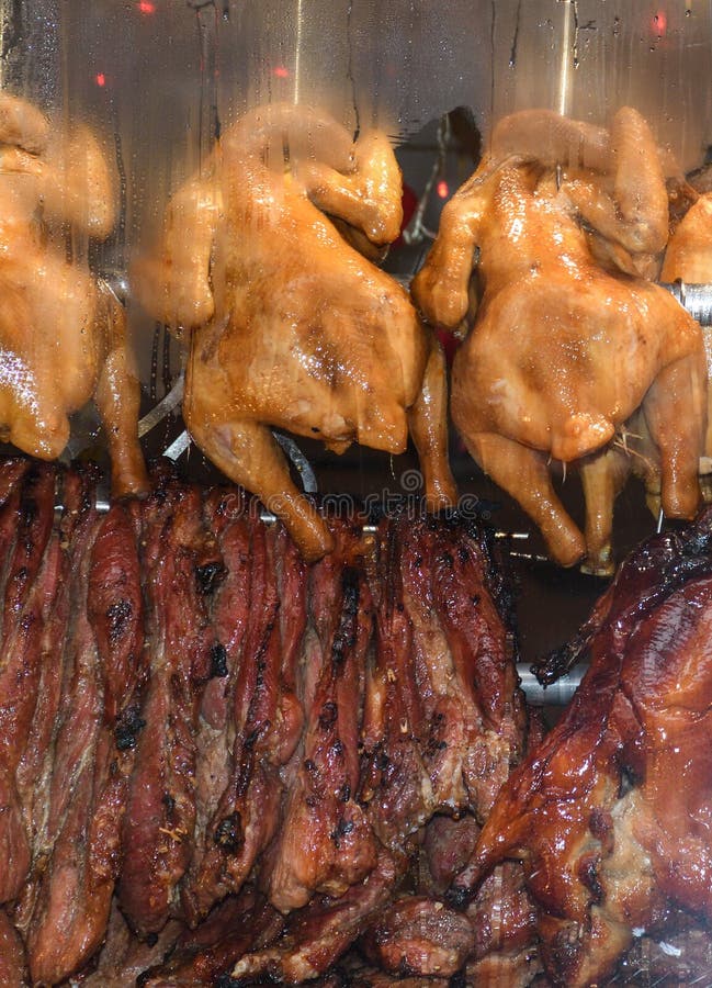 Roasted Ducks Hanging on Rack Showcase Stock Photo - Image of meat ...