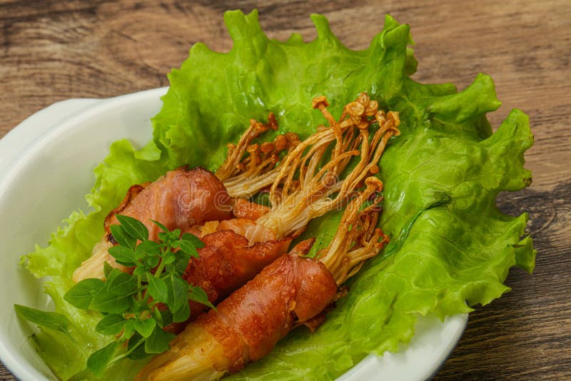 Roasted Enoki Mushrooms with Bacon Stock Image - Image of meat, closeup ...