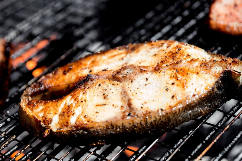 Roasted Fish on the Grill. Barbecue. Restaurant. Stock Image - Image of ...