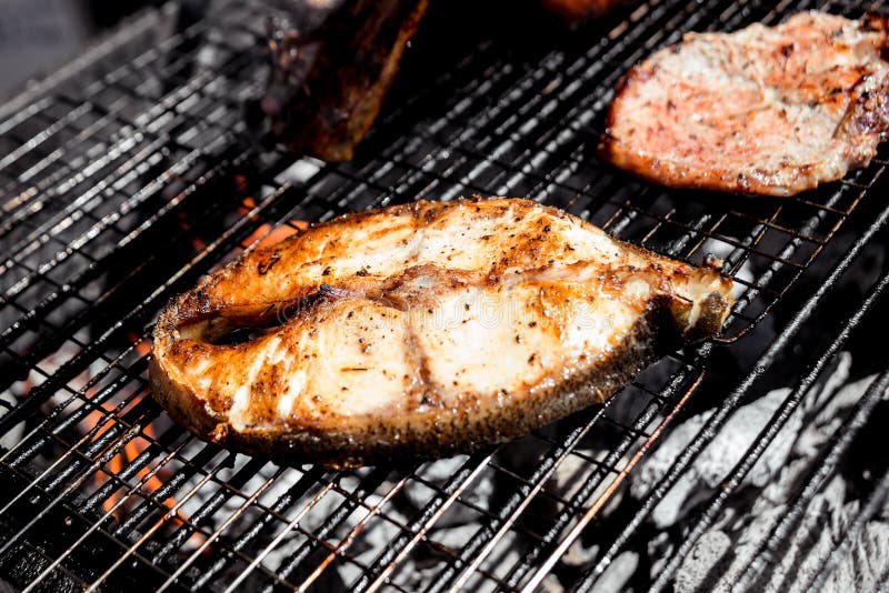 Roasted Fish on the Grill. Barbecue. Restaurant. Stock Photo - Image of ...