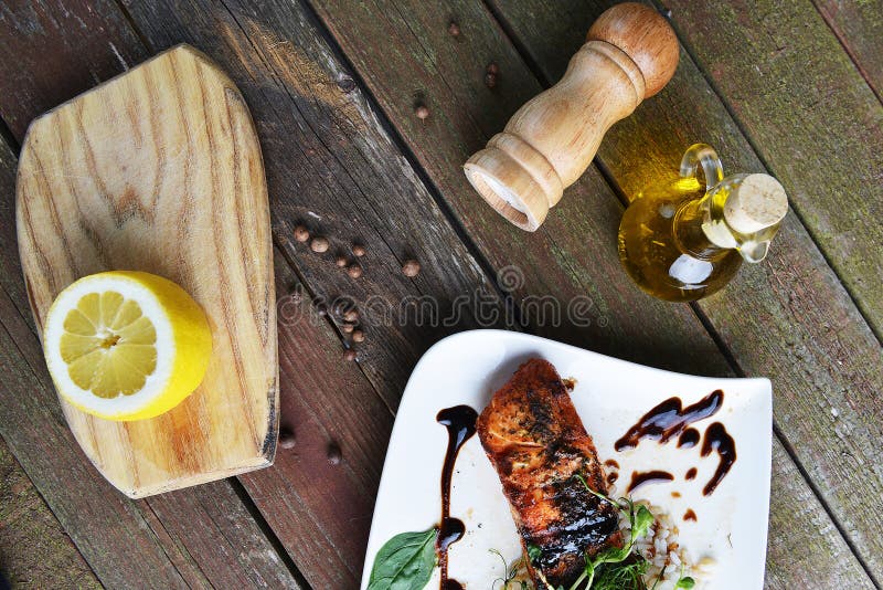 Roasted fish and rice stock photo. Image of mill, emon - 55920360