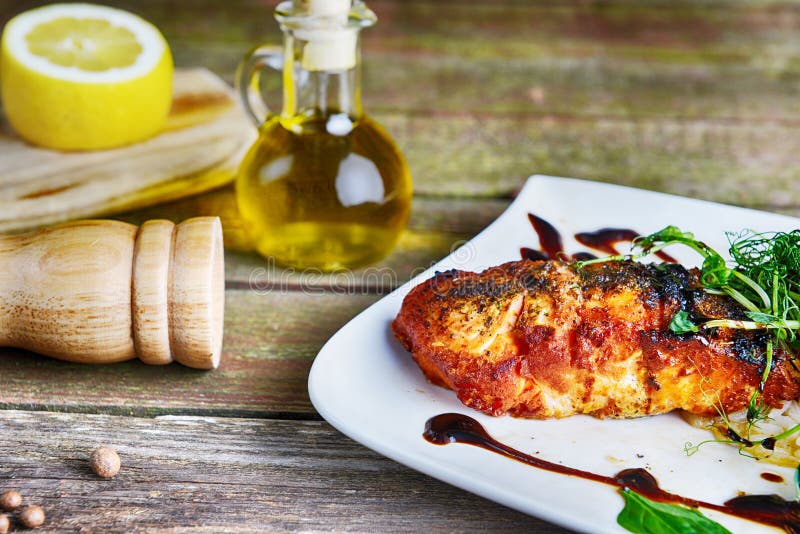 Roasted fish and rice stock photo. Image of baked, garlic - 55920786