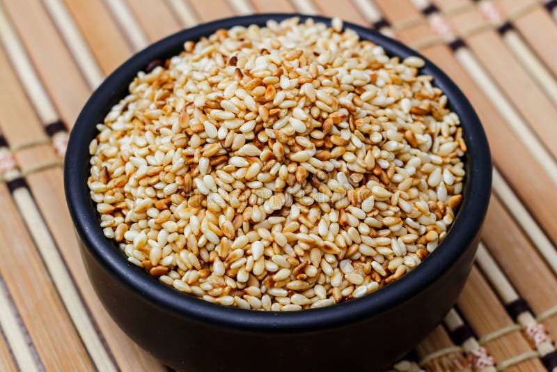 Roasted golden sesame stock photo. Image of organic - 242793376