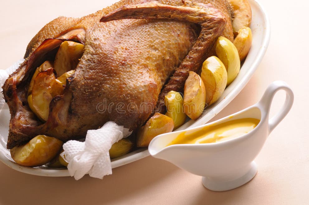 Roasted goose with apples stock photo. Image of roasted - 7809300