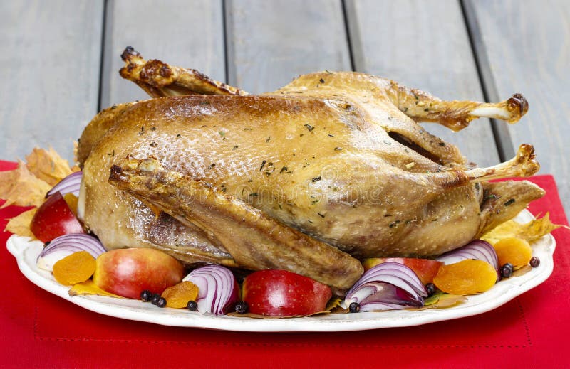 Roasted Goose with Apples and Vegetables Stock Image - Image of golden ...