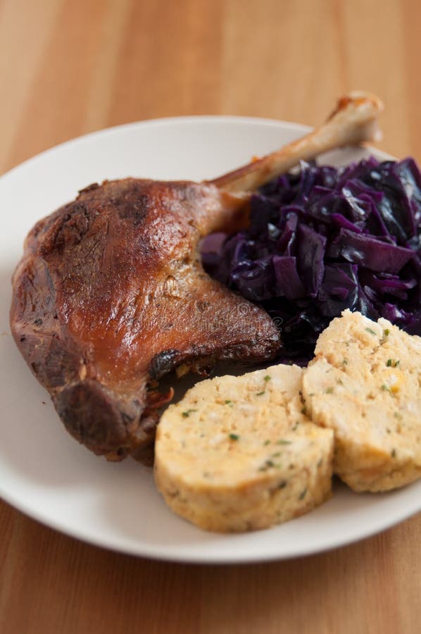 Roasted goose leg stock photo. Image of blue, dish, brown - 35261024