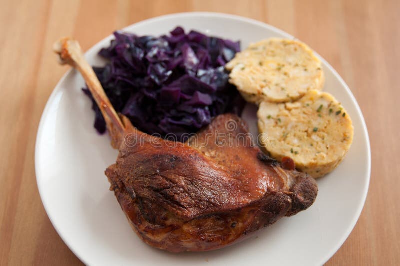 Roasted goose leg stock photo. Image of blue, dish, brown - 35261024