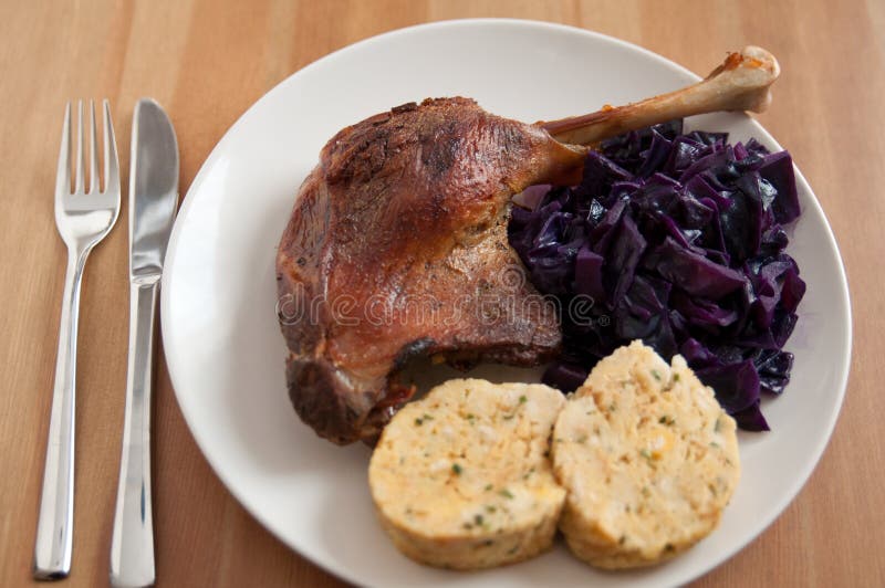 Roasted goose leg stock photo. Image of blue, dish, brown - 35261024
