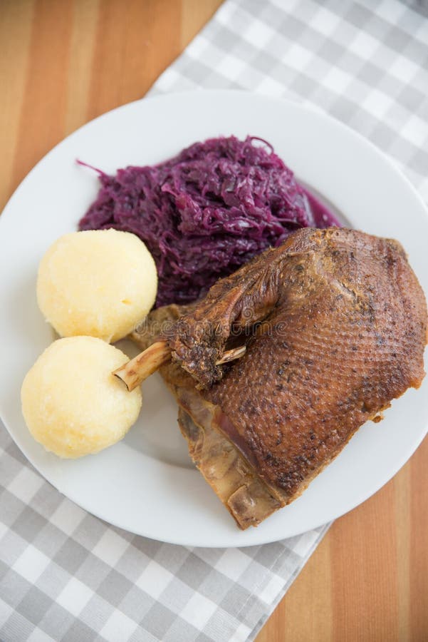 Roasted Goose Leg with Braised Red Cabbage Stock Image - Image of duck ...