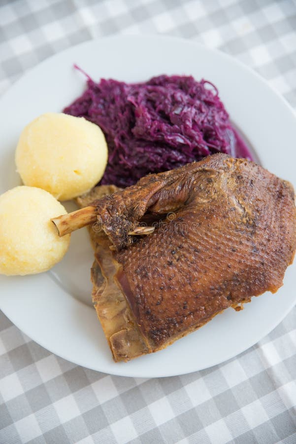 Roasted Goose Leg with Braised Red Cabbage Stock Image - Image of ...
