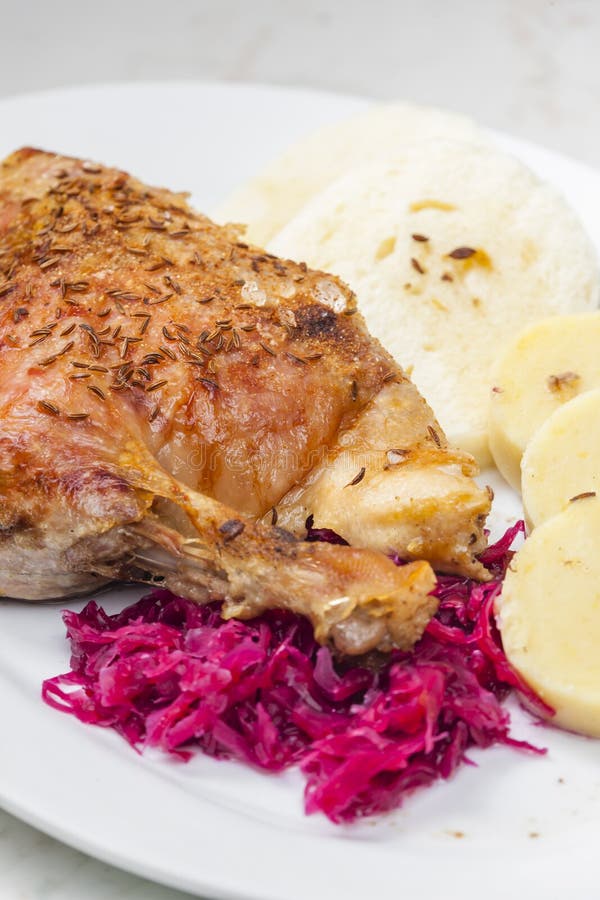 Roasted Goose Leg with Red Cabbage and Dumplings Stock Photo - Image of ...