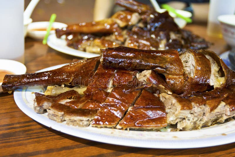 Roasted goose on table stock photo. Image of garnish - 24462438