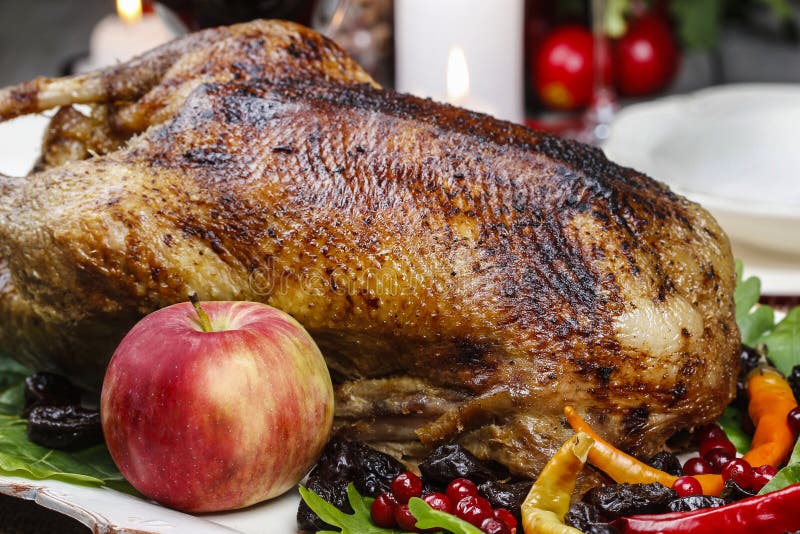 Roasted Goose on Wooden Table Stock Image - Image of duck, dish: 38417707