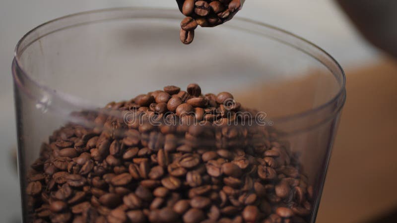 Container of Coffee Machine is Filled from Bottle with an Electric Pump ...