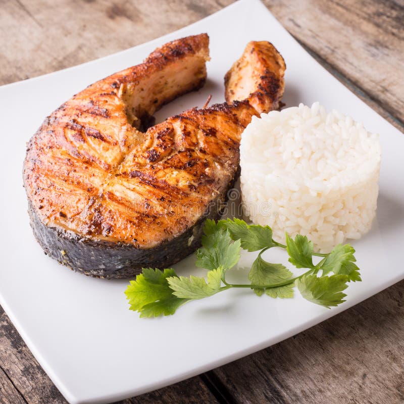 Roasted Grill Salmon Steak with Rice on Plate Stock Photo - Image of ...