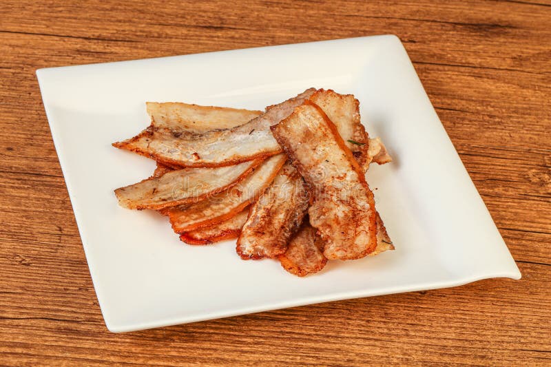 Roasted Juicy Bacon in the Plate Stock Photo - Image of fried, cooked ...