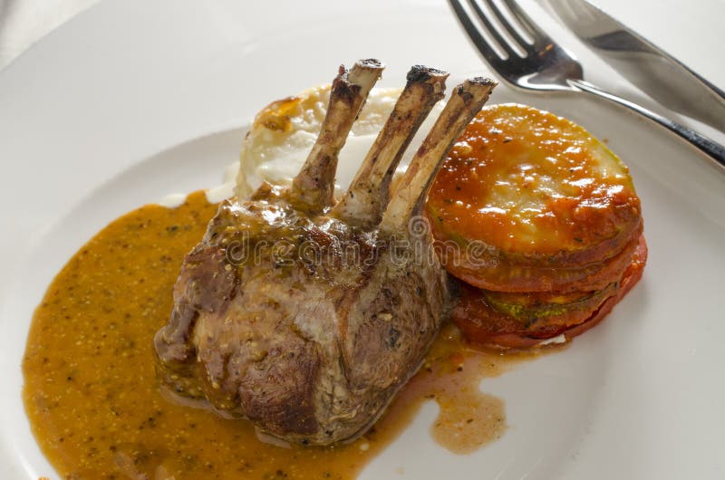 Roasted lamb rack stock image. Image of tomato, mutton - 58779495