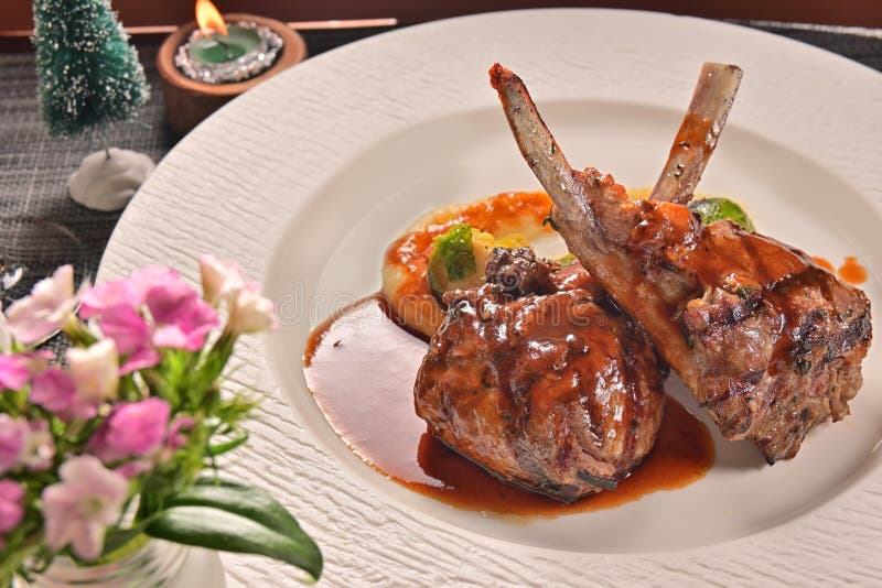 Roasted lamb rack veal jus stock photo. Image of food - 236431274