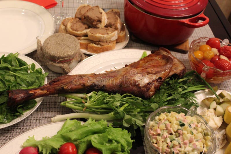 Roasted leg of young goat. stock photo. Image of meat - 86044508