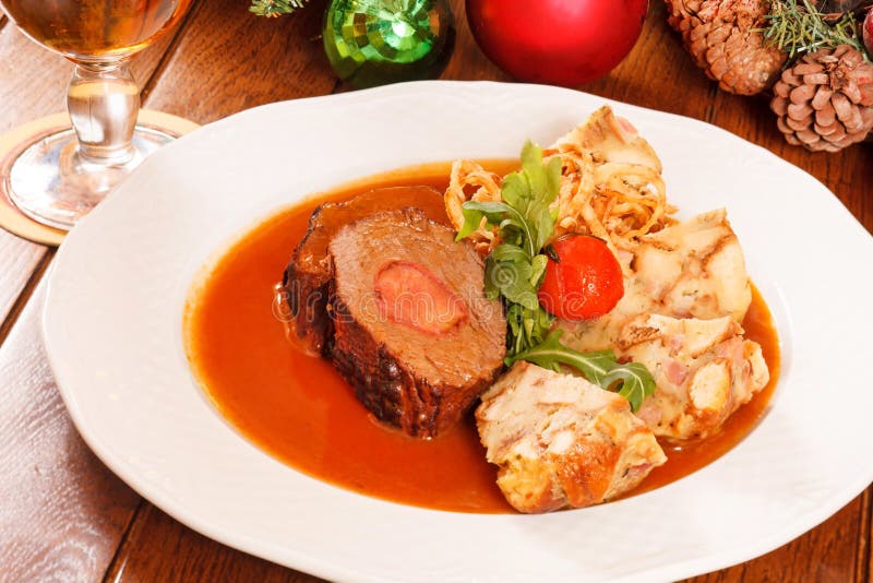 Roasted meat stock photo. Image of elegant, onion, candle - 28918838