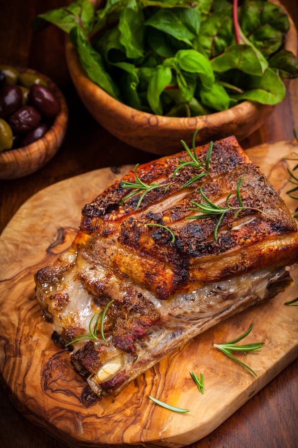 Crispy Roast Pork Belly. Sliced Roasted Meat with Crust in a Tray with ...