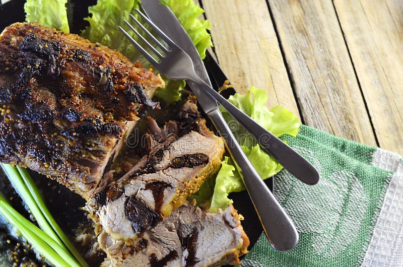 Roasted meat with prunes stock image. Image of kitchen - 64849857