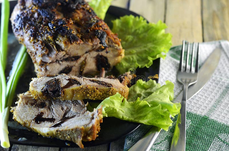 Roasted meat with prunes stock photo. Image of pork, dish - 64851932