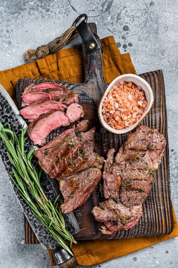 Roasted Mutton Leg Steaks, Sliced Lamb Meat. Gray Background Stock ...