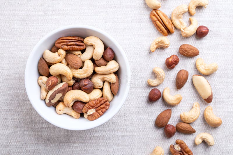 Roasted Nuts, Crunchy Nut Mix, Snack Food in White Bowl on Linen Stock ...