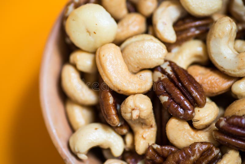 Roasted Nuts in Wooden Bowl Stock Image - Image of food, healthy: 63160215