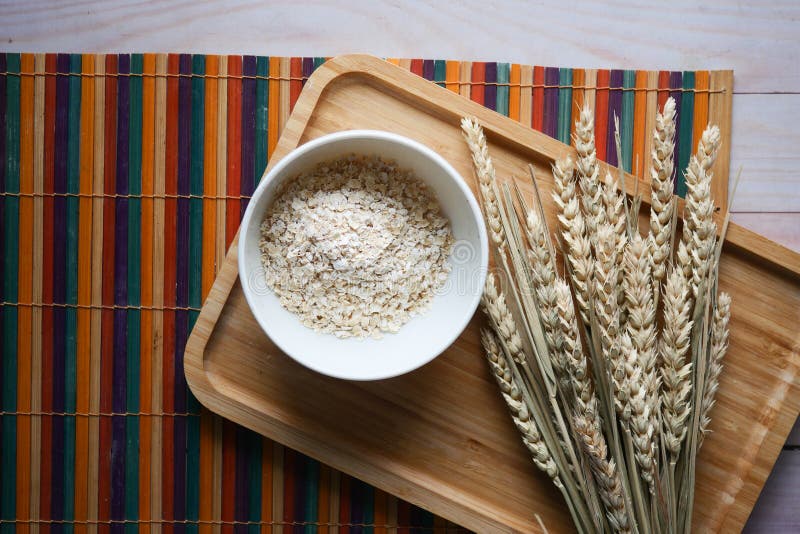 Roasted Oats Flakes in a Bowl on Table Stock Image - Image of cereal ...