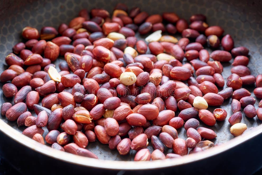 Roasted Peanuts in a Frying Pan Stock Photo - Image of cuisine, hand ...