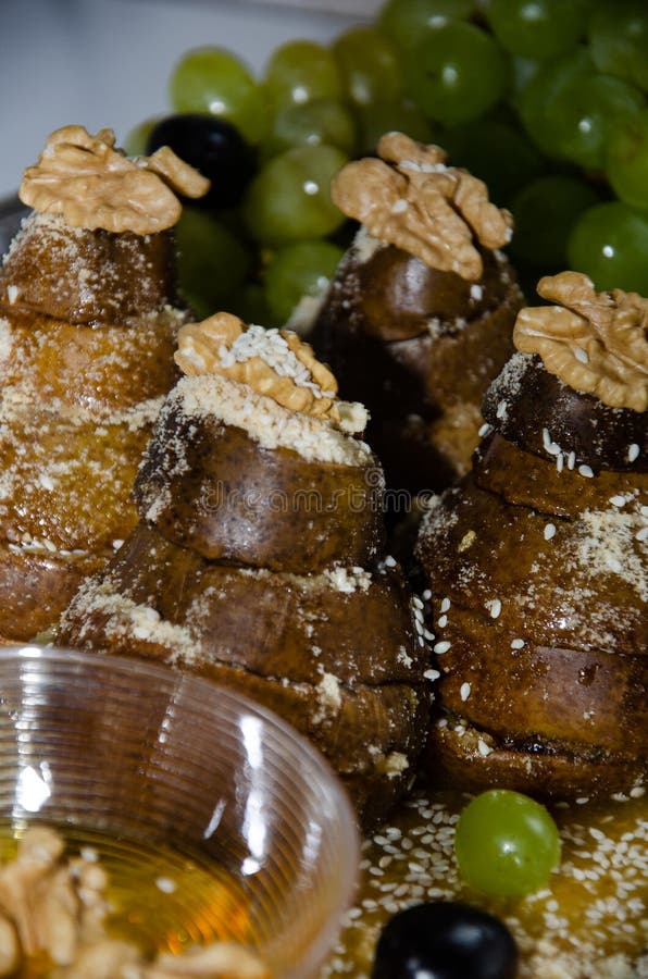 Roasted Pear Dish with Sesame Honey and Grapes Stock Image - Image of ...