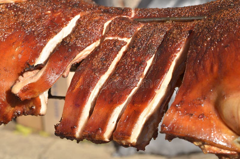 Spit Roasted Pork Bacon. Delicious Pig Meat Roasted in Open Air. Stock ...