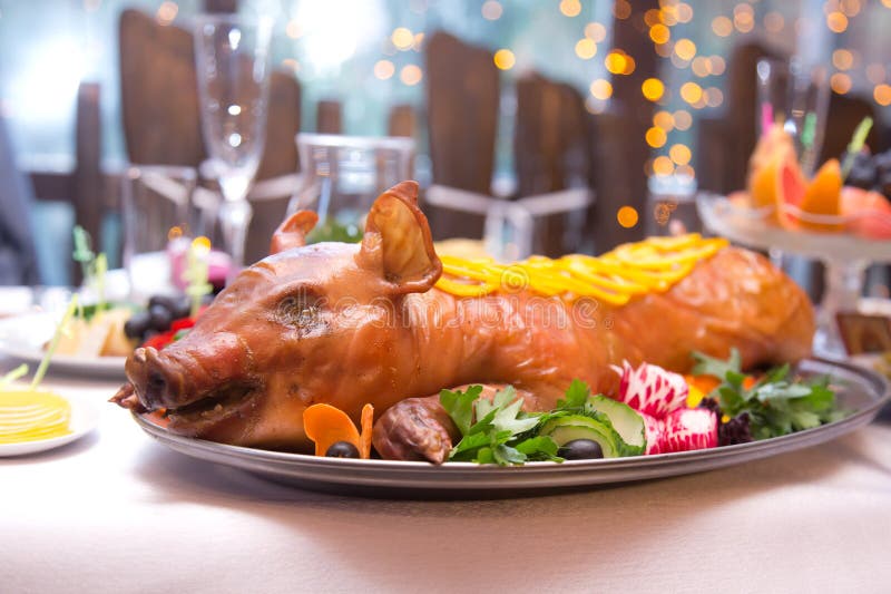 Roasted Piglet with Vegetables on Platter Stock Photo - Image of ...