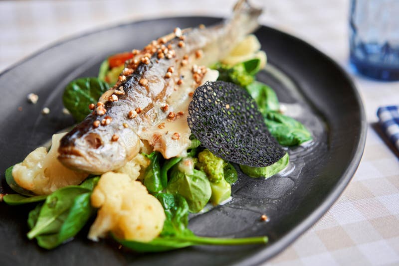 Roasted Pike Perch or Cod Fish with Baked Vegetables and Spinach. Dish ...