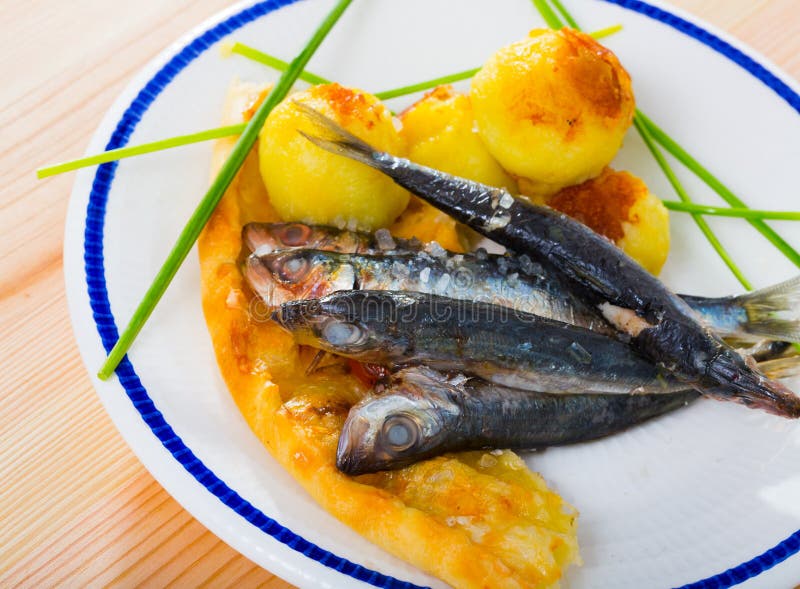 Roasted Pilchards with Potato Balls and Focaccia Stock Image - Image of ...