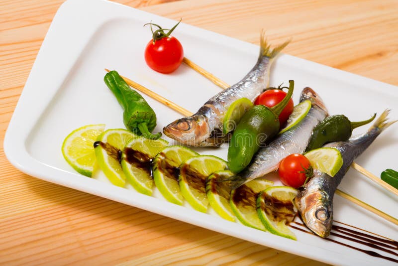 Roasted Pilchards with Vegetables Stock Image - Image of potherbs, dish ...