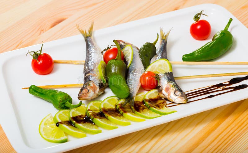 Roasted Pilchards with Vegetables Stock Photo - Image of fish, peppers ...