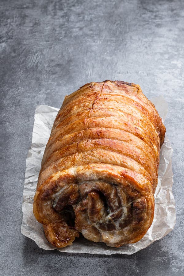 Roasted Pork Meat Roll with Herbs and Spices on Gray Stone Background ...