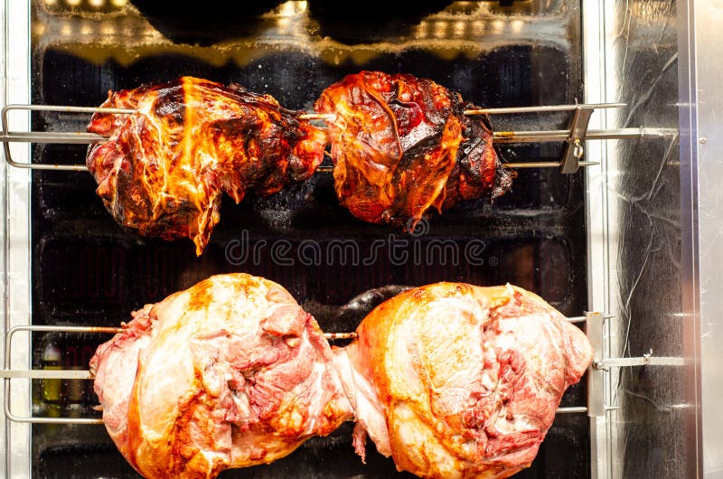 Roasted Pork Meat on Spit Grilled Over Fire Stock Photo - Image of meal ...