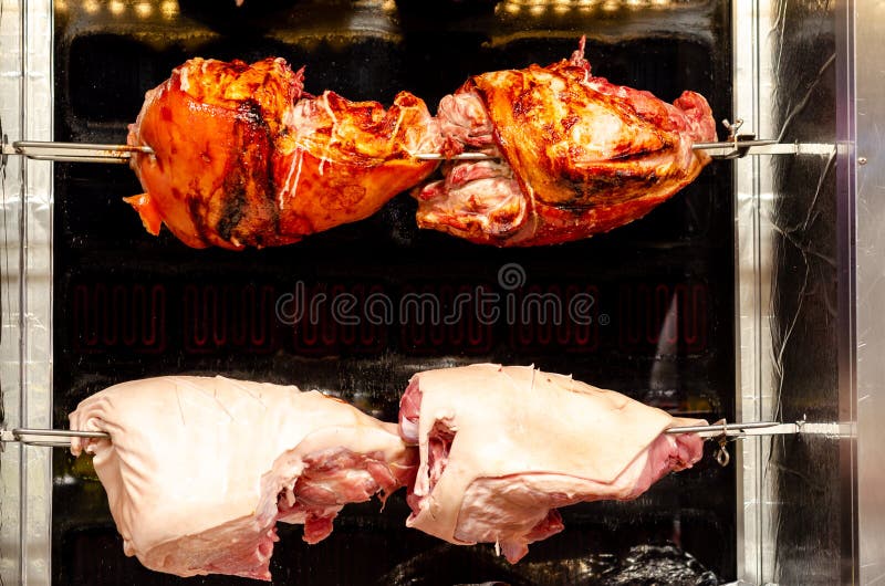 Roasted Pork Meat on Spit Grilled Over Fire Stock Photo - Image of ...